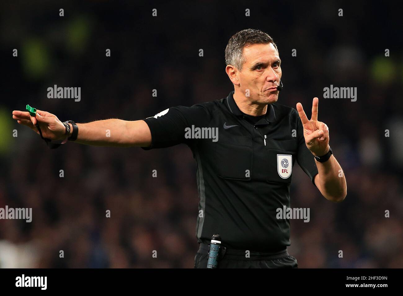 London, UK. 12th Jan, 2022. Referee Andre Marriner in action . Carabao ...