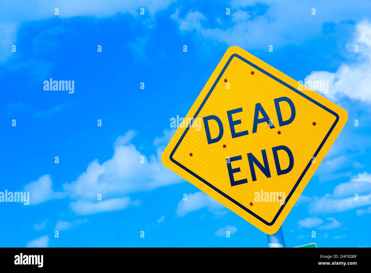 dead end street sign under blue sky with clouds Stock Photo - Alamy