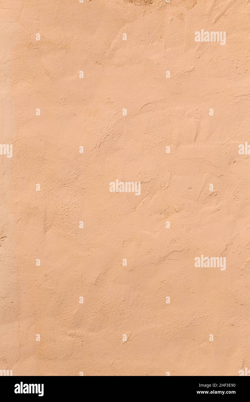 orange plaster wall painted in uni color Stock Photo - Alamy