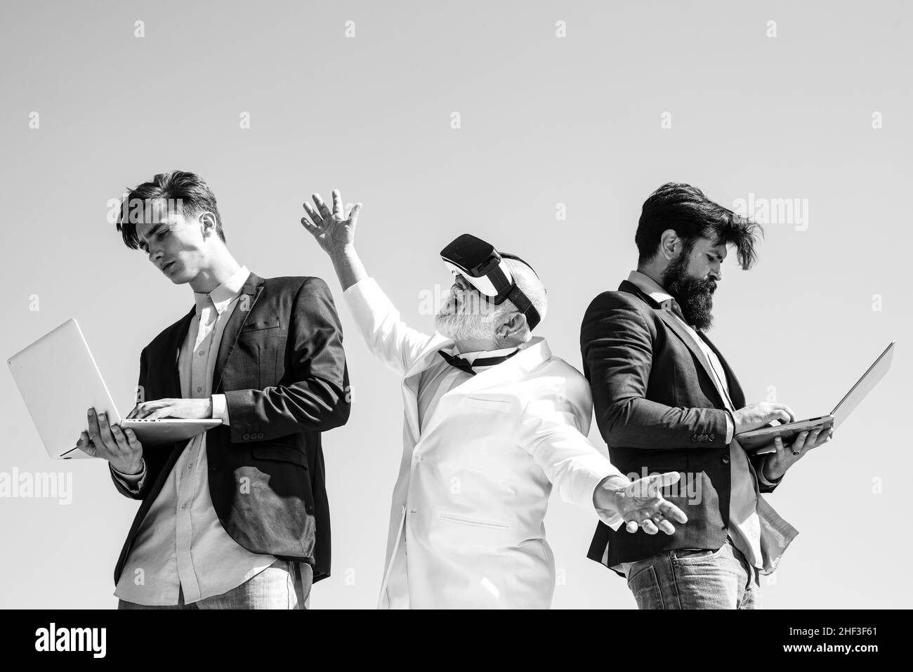 VR business. Team with laptop. Business people. Businessman working ...