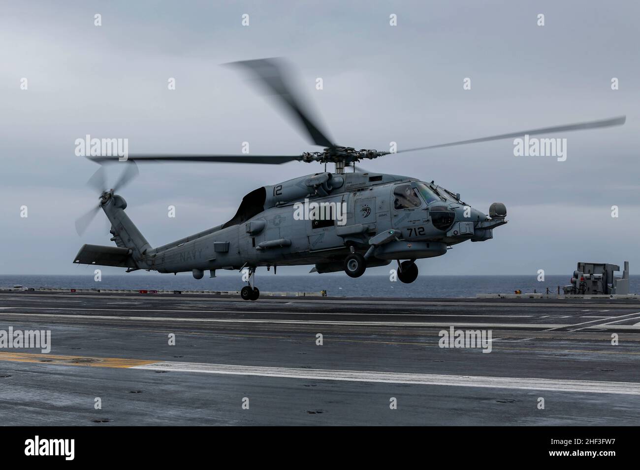 PACIFIC OCEAN (Jan. 8, 2022) An MH-60R Sea Hawk helicopter, assigned to ...