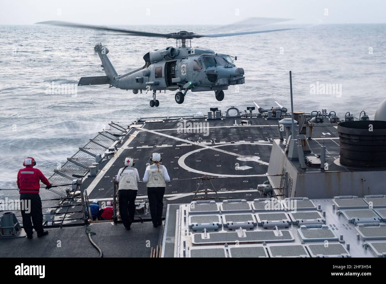 220106-N-MR124-1096 INDIAN OCEAN (Jan. 6, 2022) An MH-60R Seahawk ...