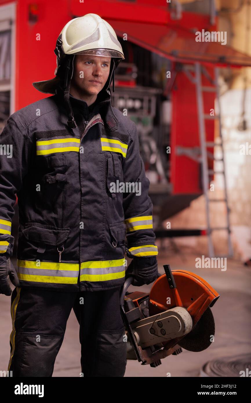 Firefighter wearing hard hat hi-res stock photography and images - Alamy