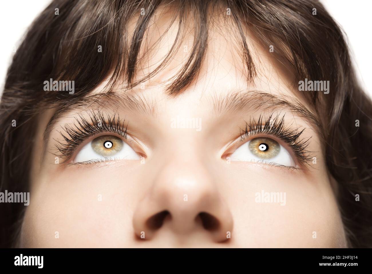 Beautiful young girl studio portrait. Abstract eyes looking up Stock ...