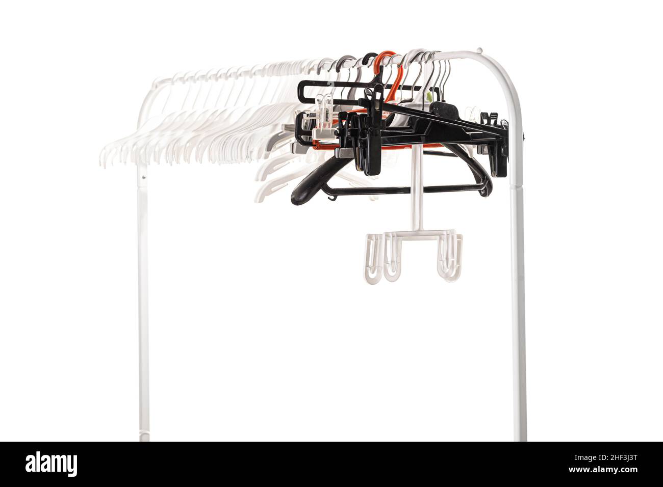 Plastic hangers for clothes hanging on rod from clothing rack. Isolated ...