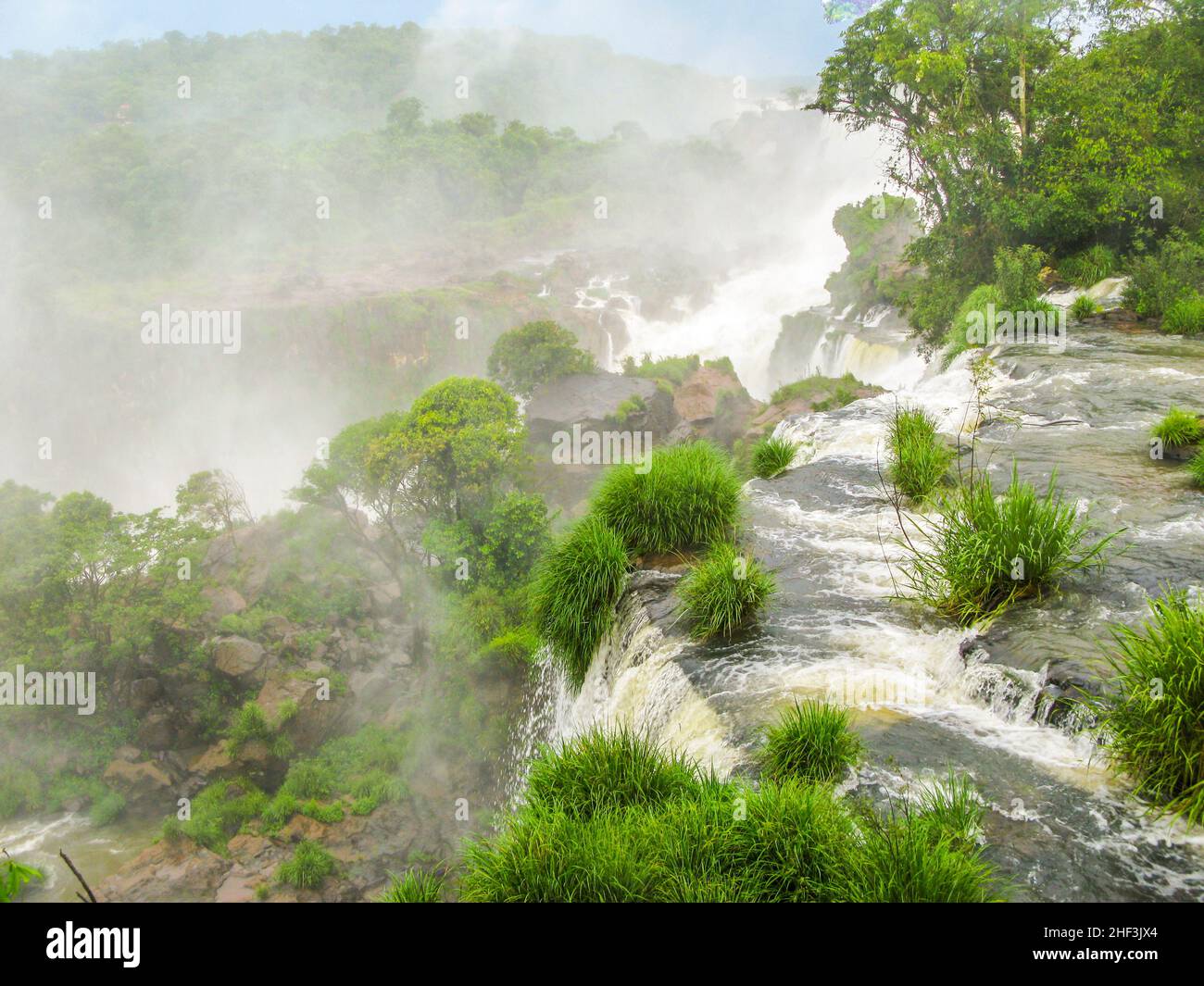 Iguassu waterfall in south america tropical jungle with a massive flow ...