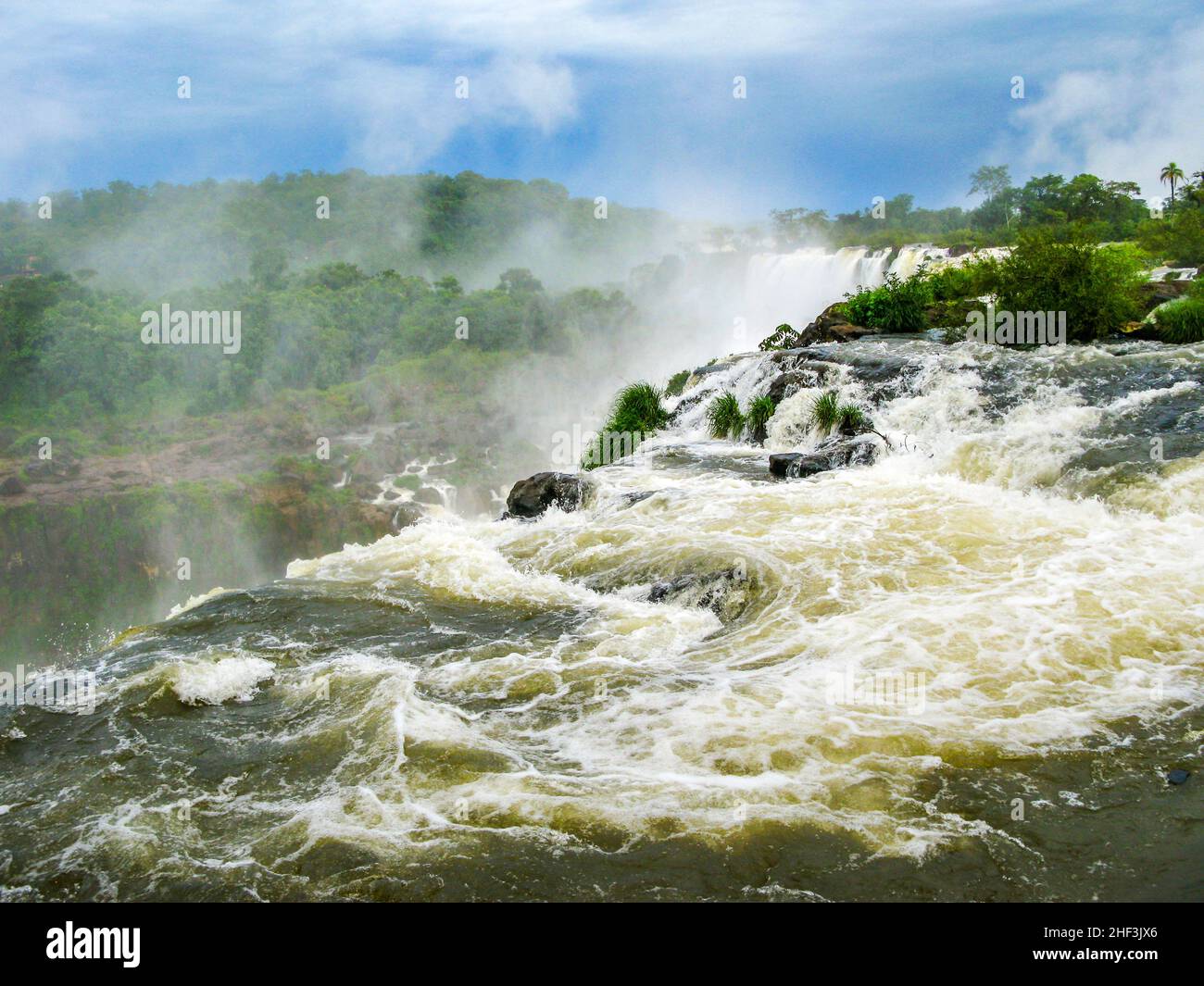 Iguassu waterfall in south america tropical jungle with a massive flow ...