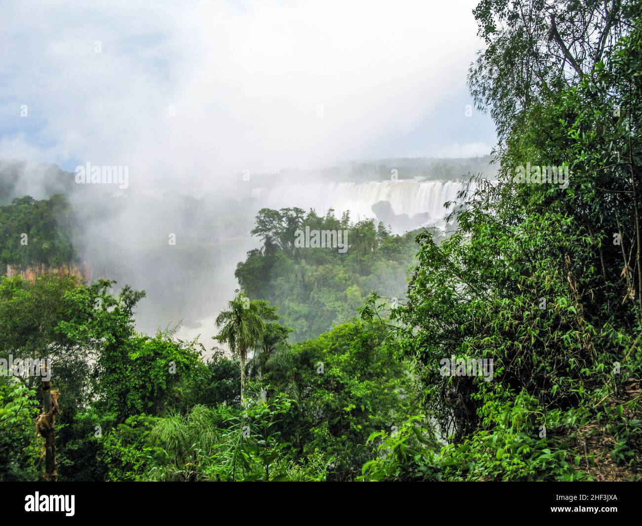 Iguassu waterfall in south america tropical jungle with a massive flow ...