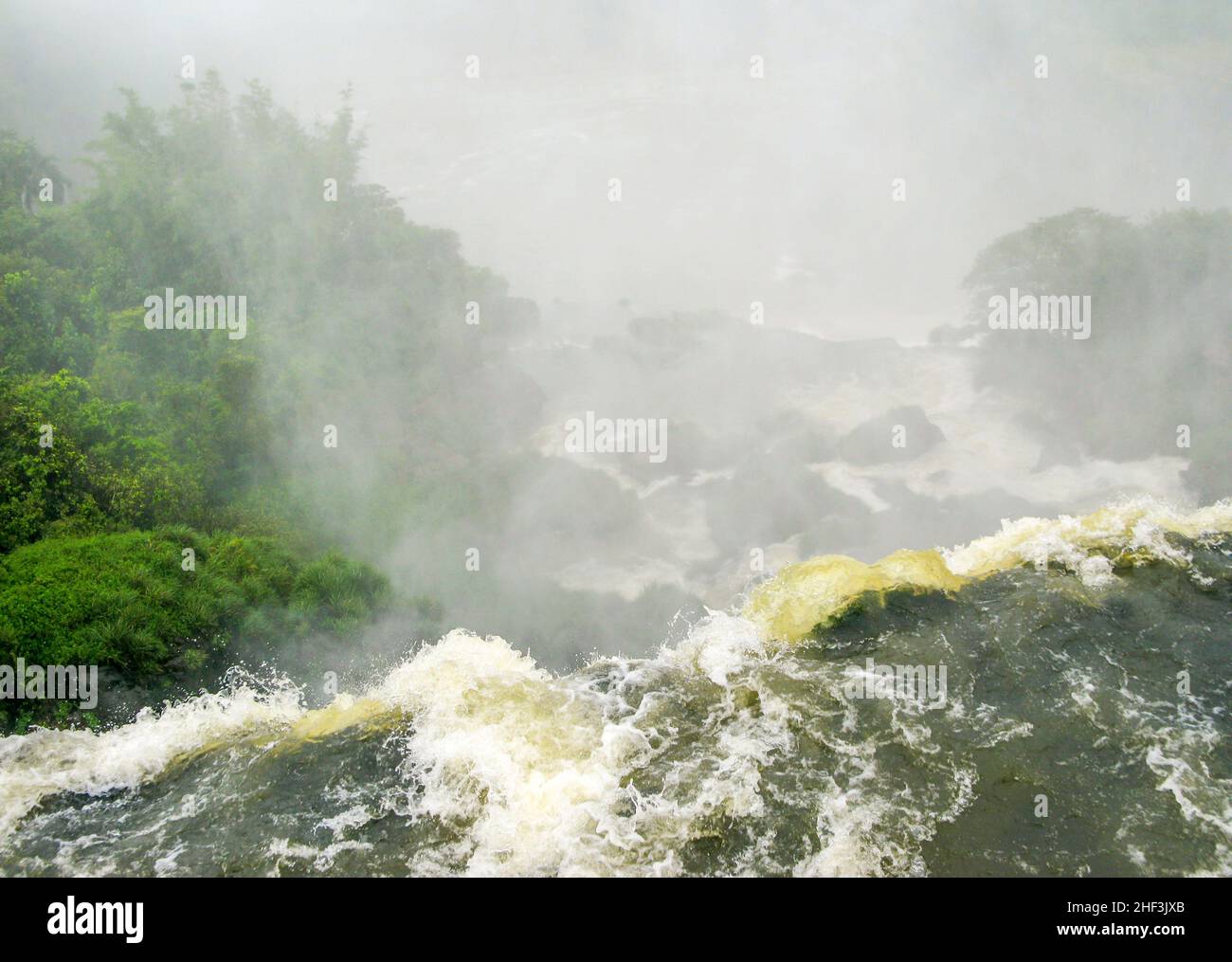 Iguassu waterfall in south america tropical jungle with a massive flow ...