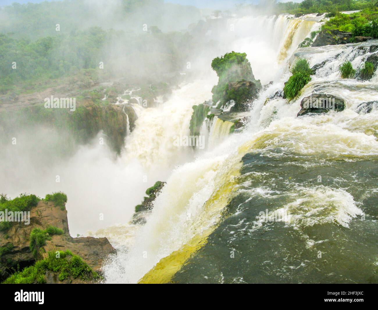 Iguassu waterfall in south america tropical jungle with a massive flow ...