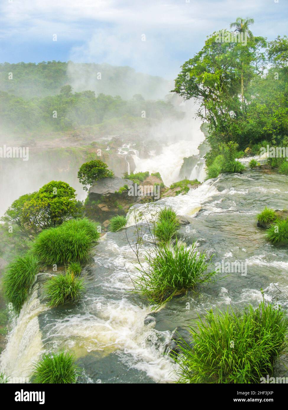 Iguassu waterfall in south america tropical jungle with a massive flow ...