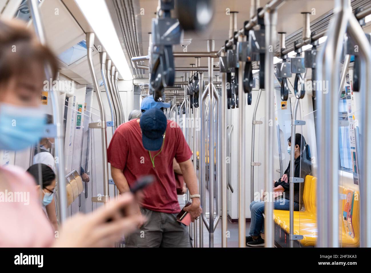 The Environment of Asia passengers inside the Sky Train with the masks ...