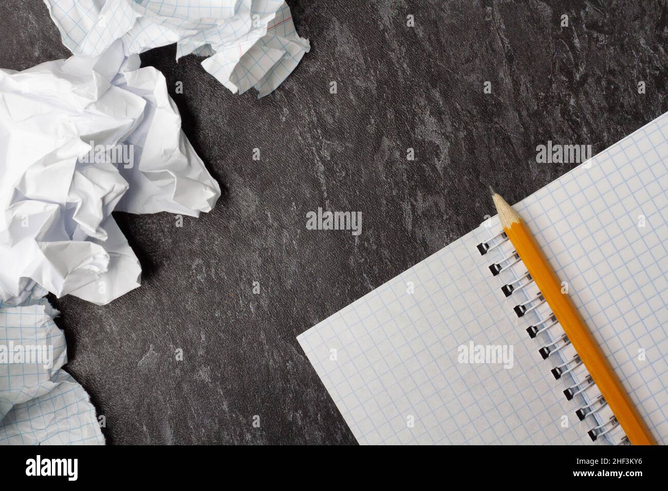 Crumpled and torn paper on the table. Torn piece of notebook. Paper ...