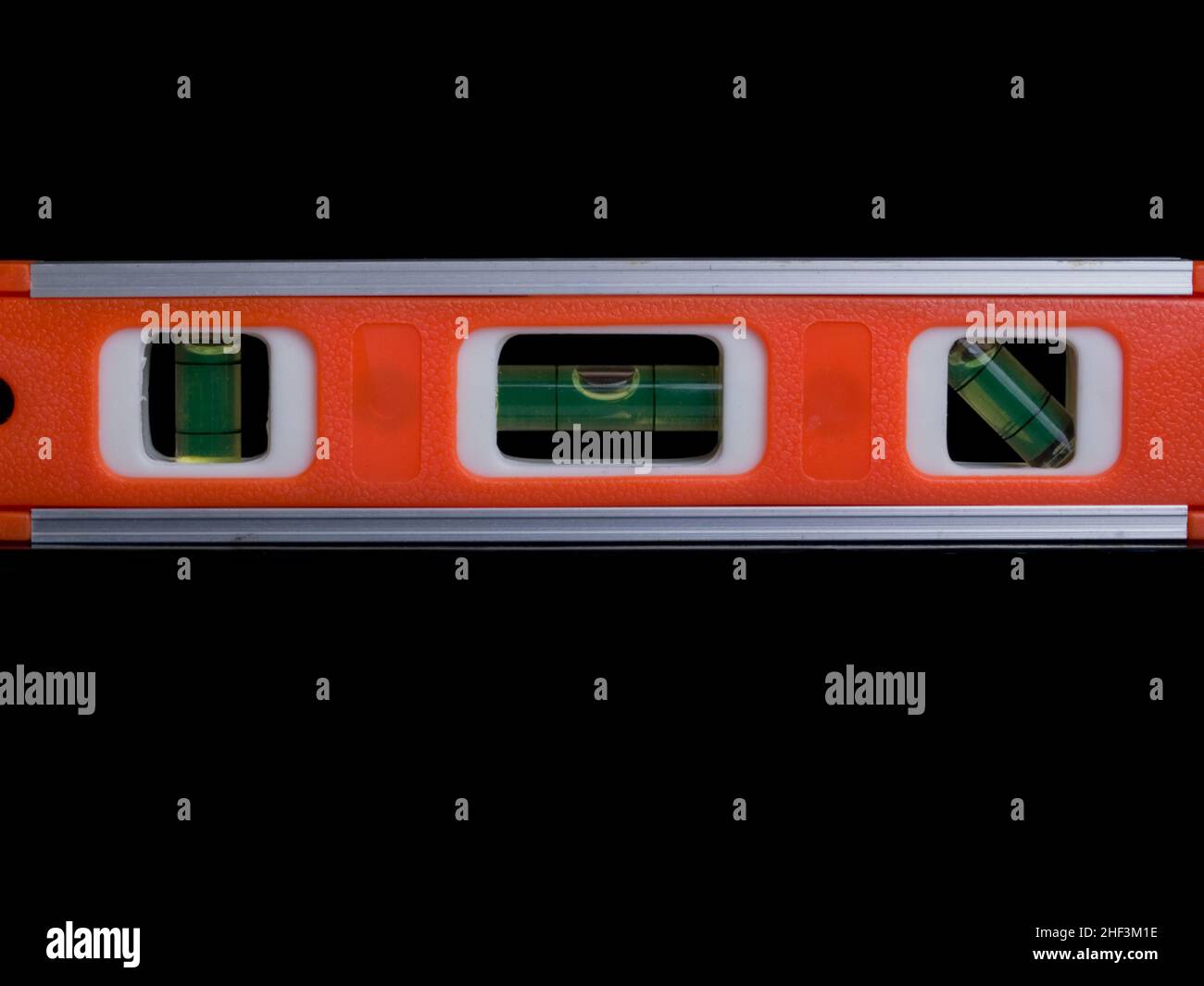 Carpenter level On Black Stock Photo - Alamy