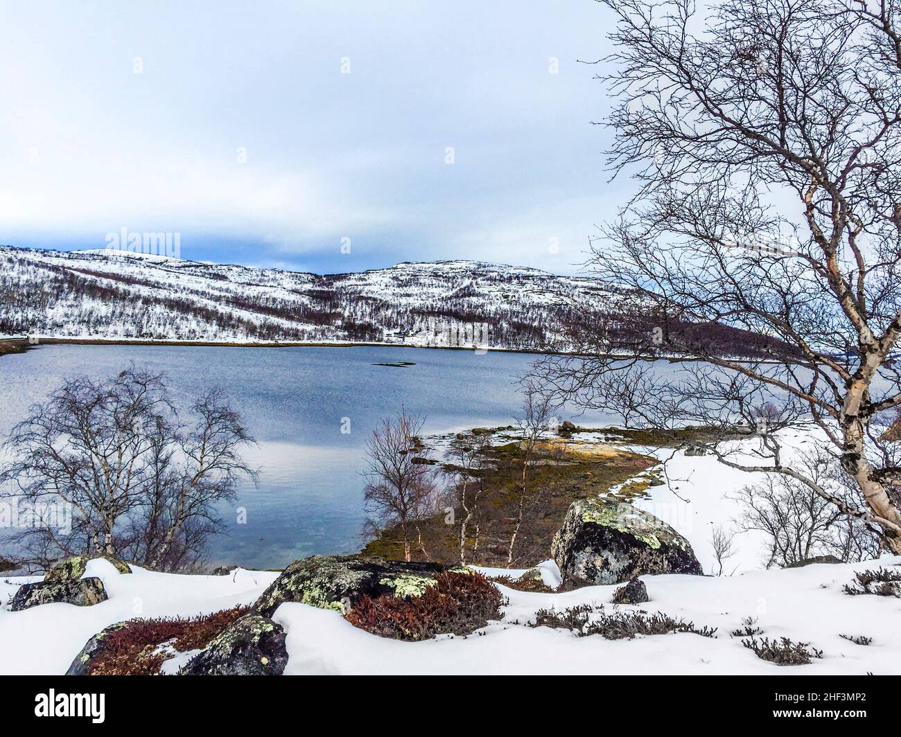 landscape in Norway under snow with icy lake Stock Photo - Alamy