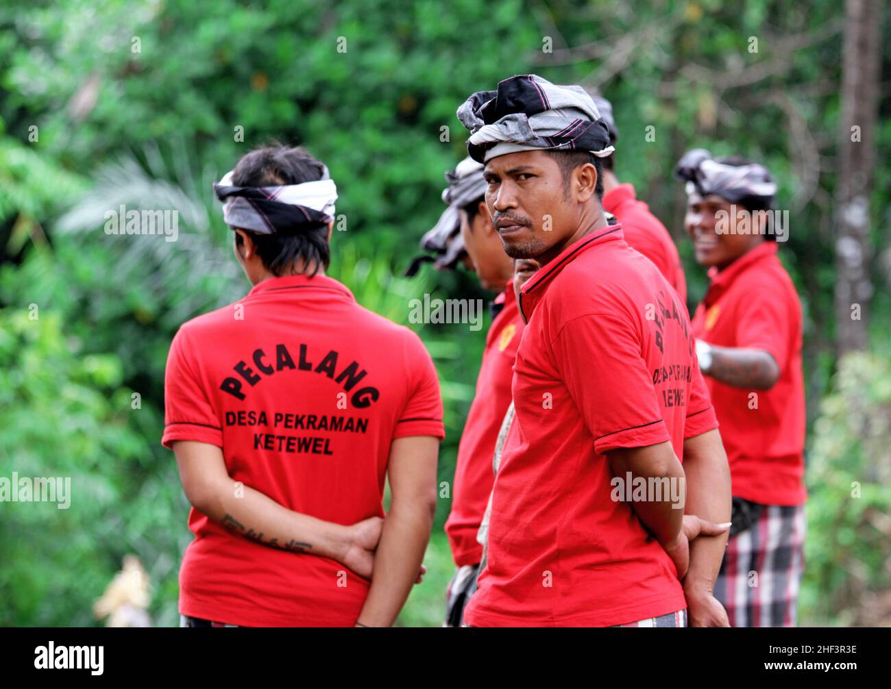 Pecalang or religious police at a ceremony taking place in the village ...