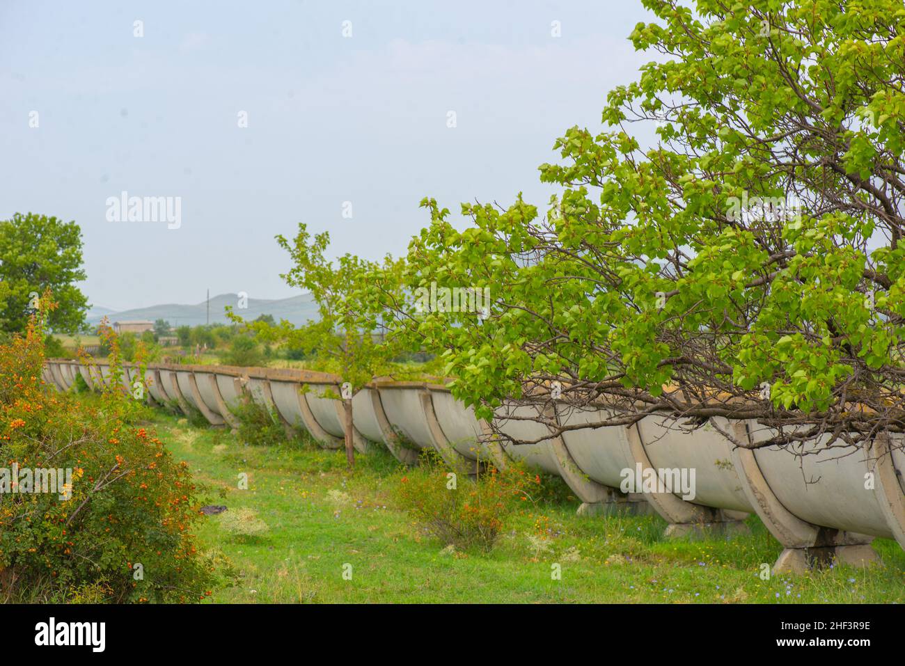 a long water ditch goes through the fields Stock Photo - Alamy