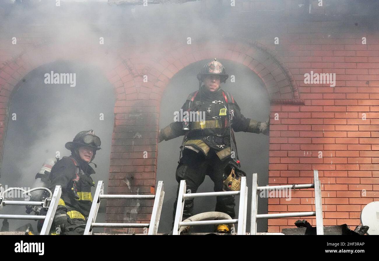 St. Louis, United States. 13th Jan, 2022. St. Louis firefighters look ...