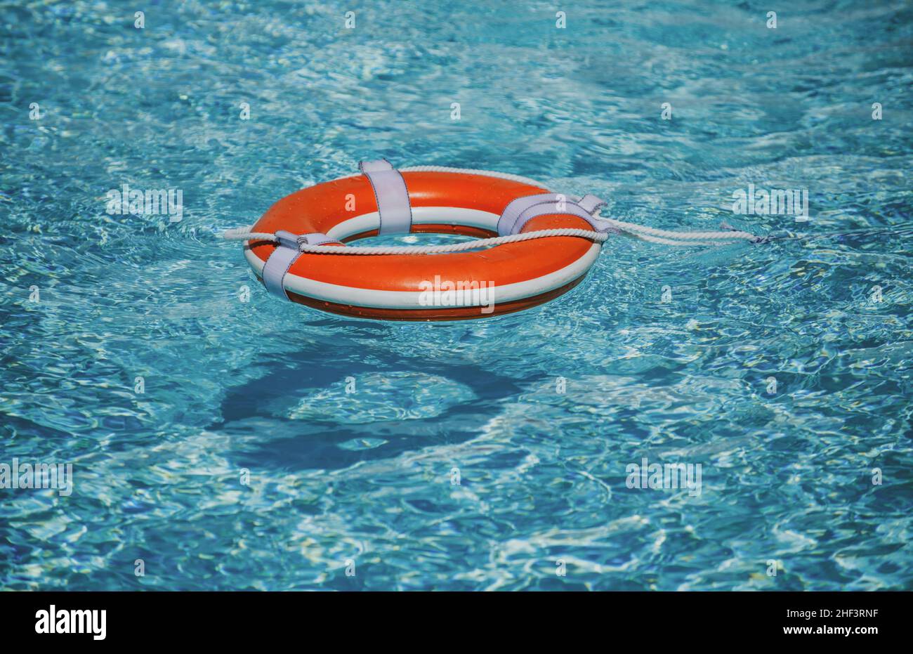 Help and drowning concept. Life saver ring floating in the water Stock ...