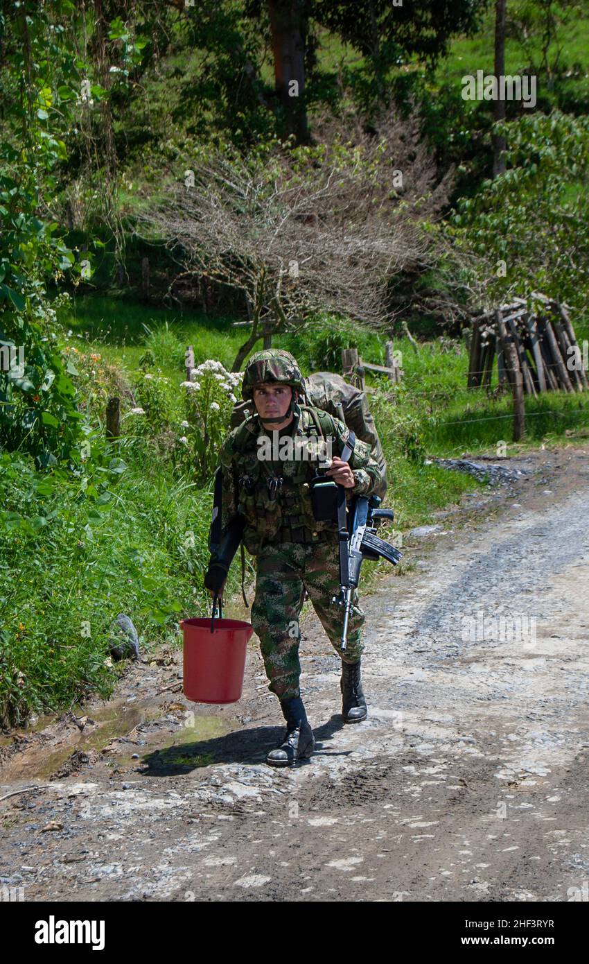 Colombian soldiers walking in rural area Stock Photo - Alamy