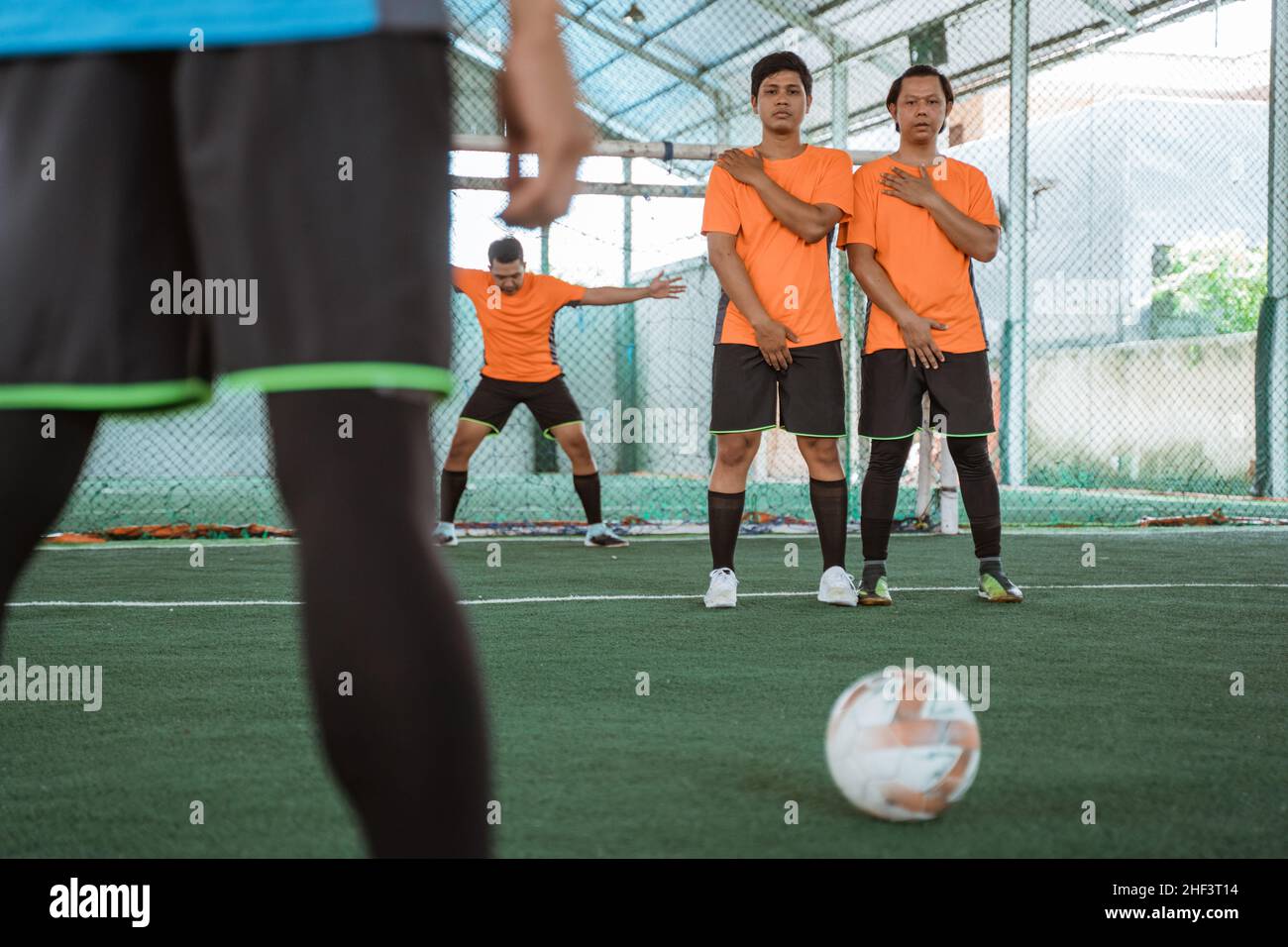 Two futsal players build a posse to block the opponent's Stock Photo ...