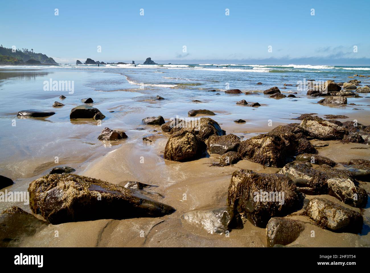 Indian Beach Rocky Shore USA. Rocks dot the sand on Indian Beach in ...