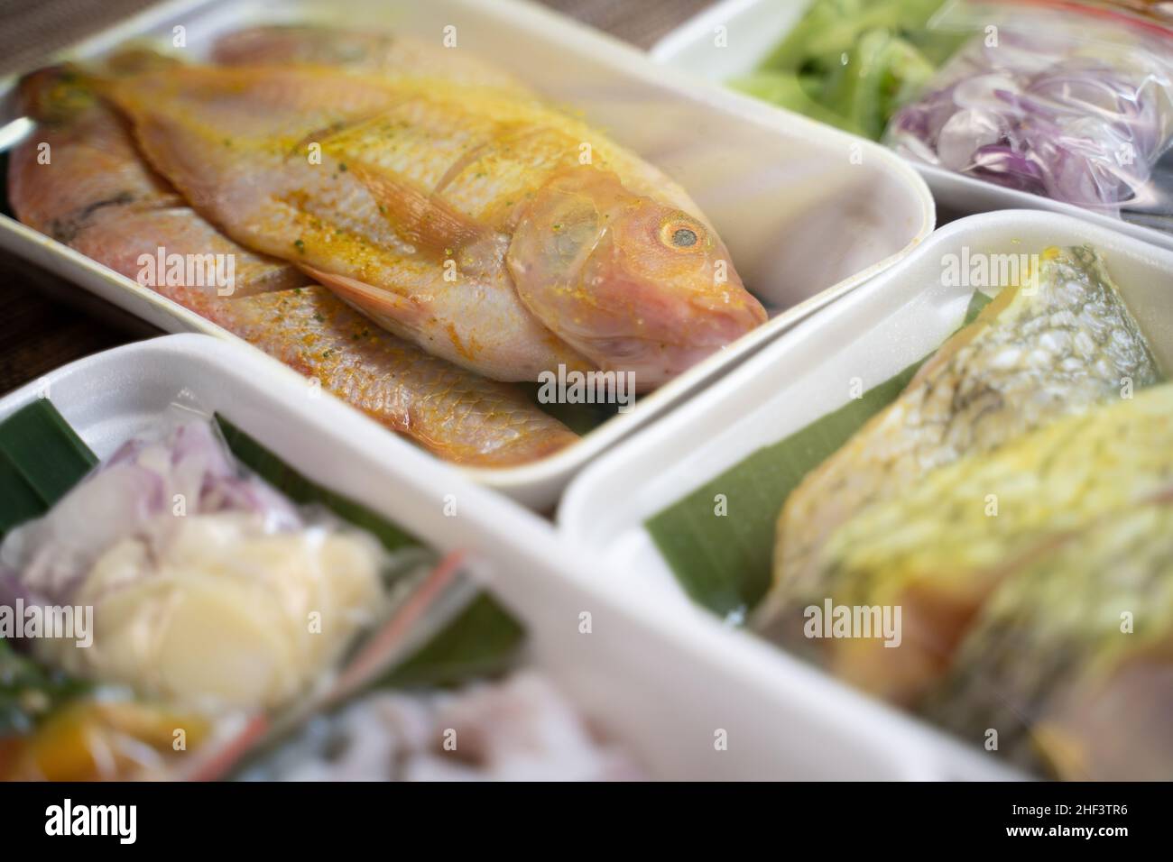 Tilapia is wrapped in a polyethylene polymer packaging Stock Photo - Alamy