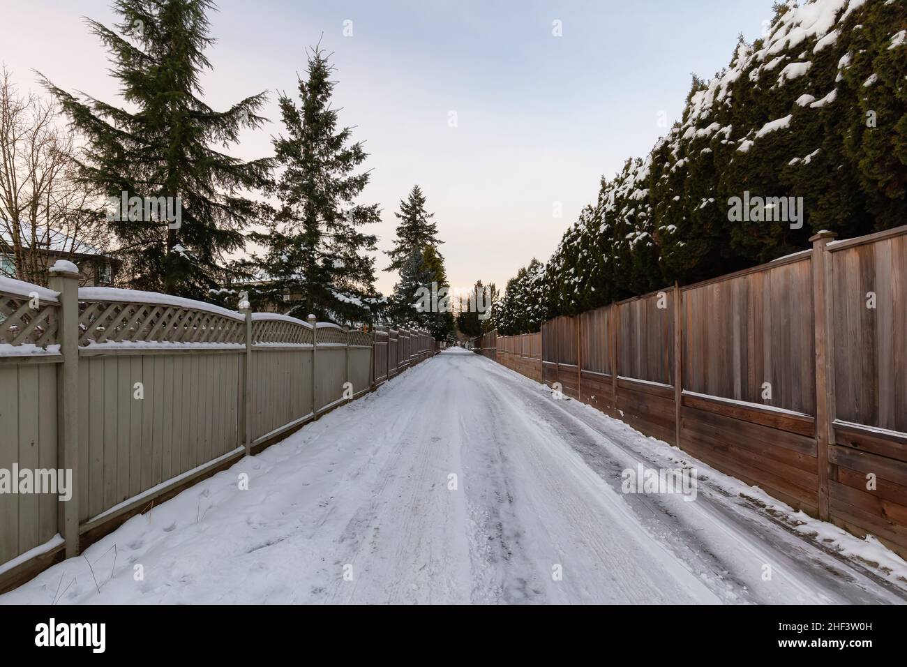 Alley with Snow in a residential neighborhood in the city suburbs Stock ...