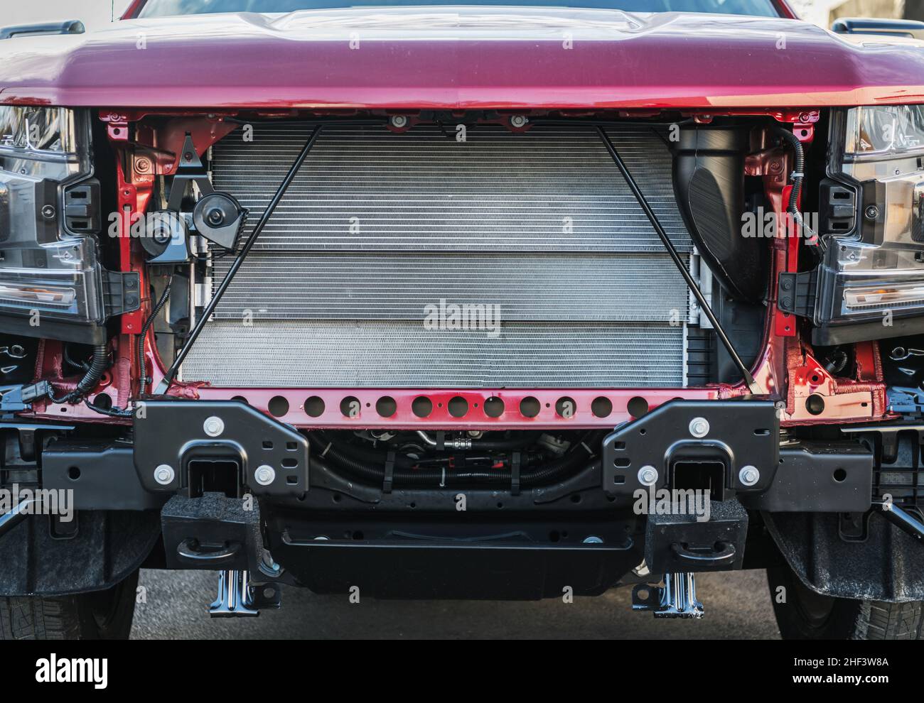 Modern Car Radiator Replacing. Central Component of a Vehicle's Cooling ...