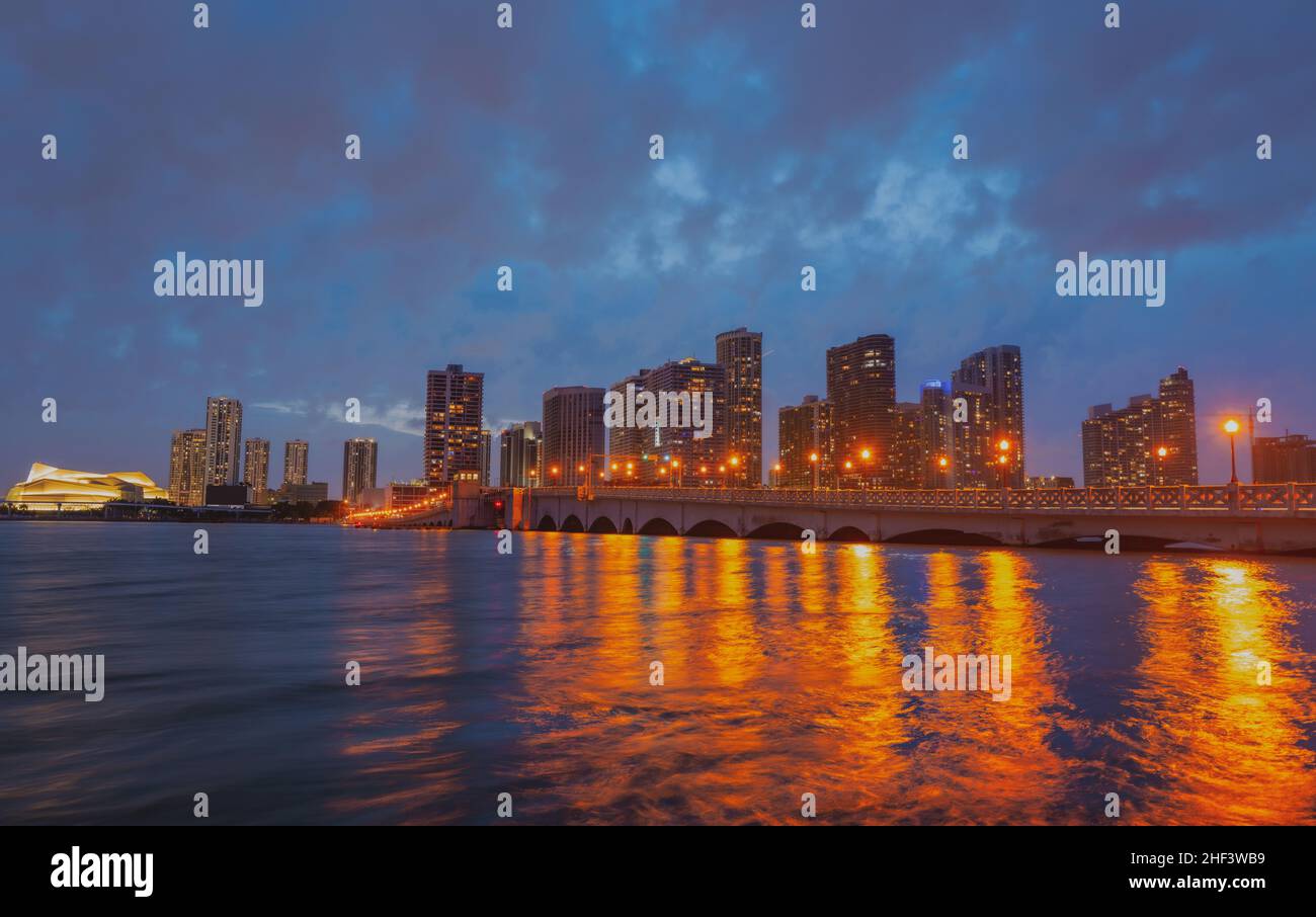 Miami at sunset. Miami Florida, colorful skyline of Macarthur causeway ...