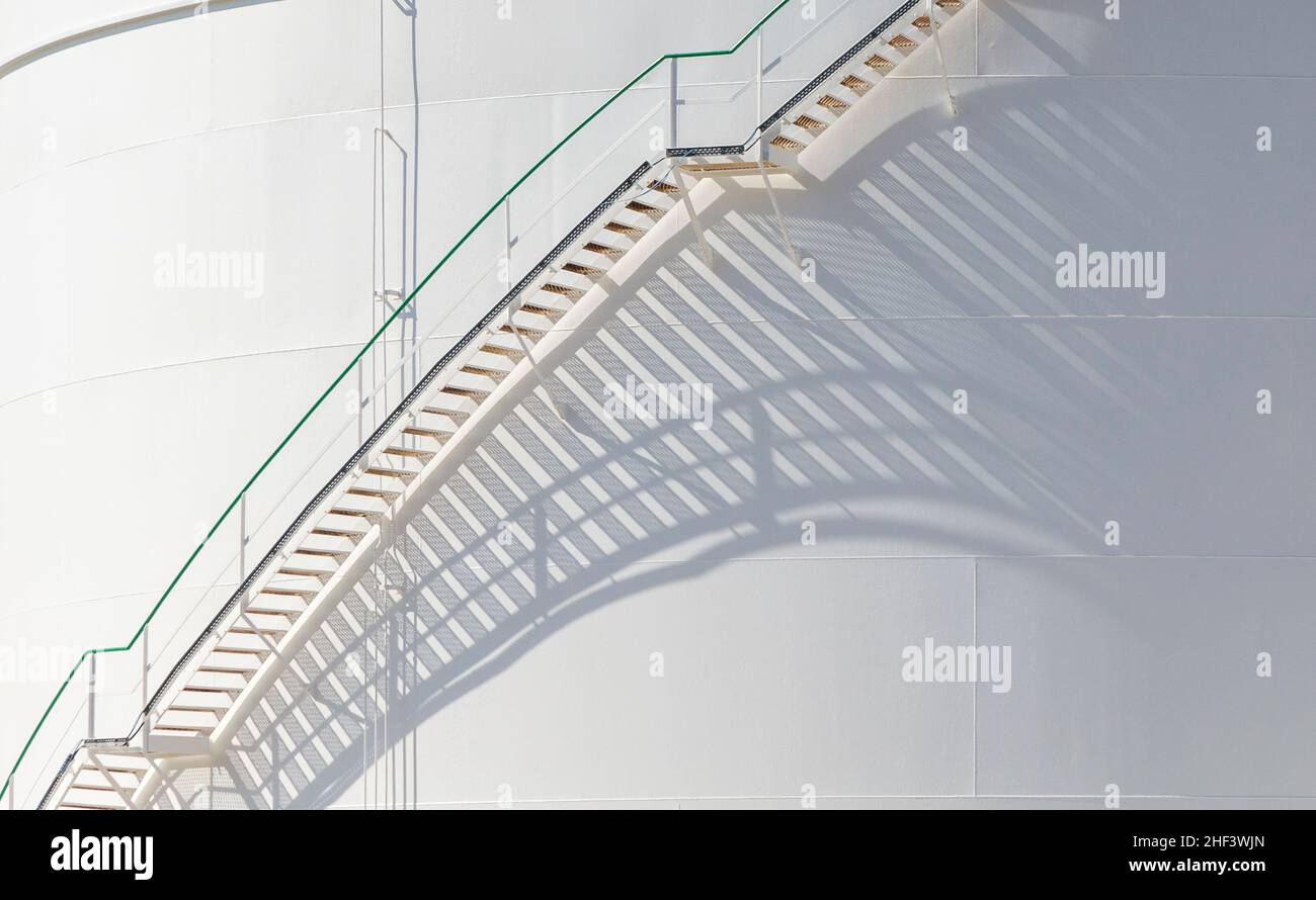 detail of white tanks in tank farm with iron staircase Stock Photo - Alamy