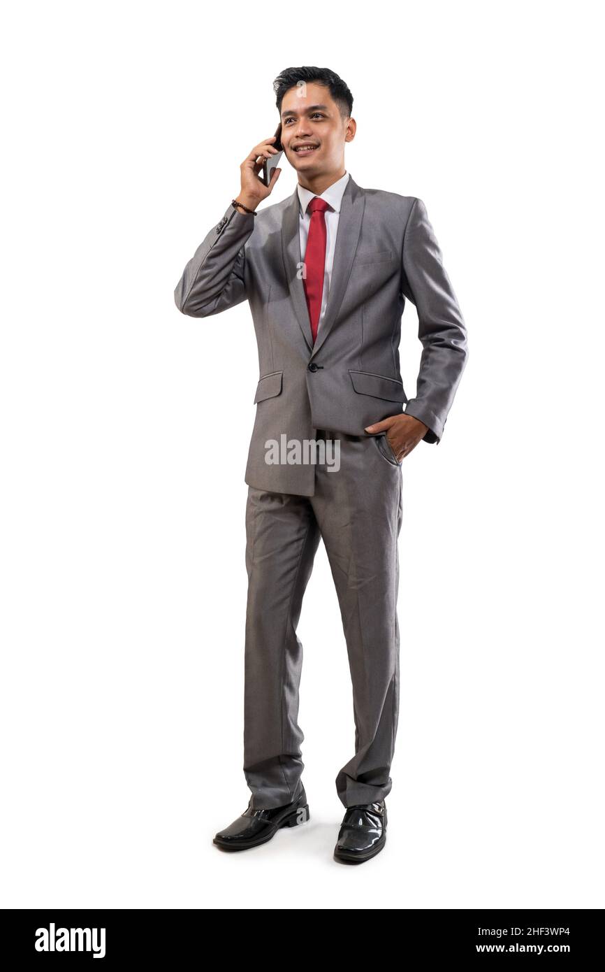 Male employee using smartphone Cut Out Stock Images & Pictures - Alamy