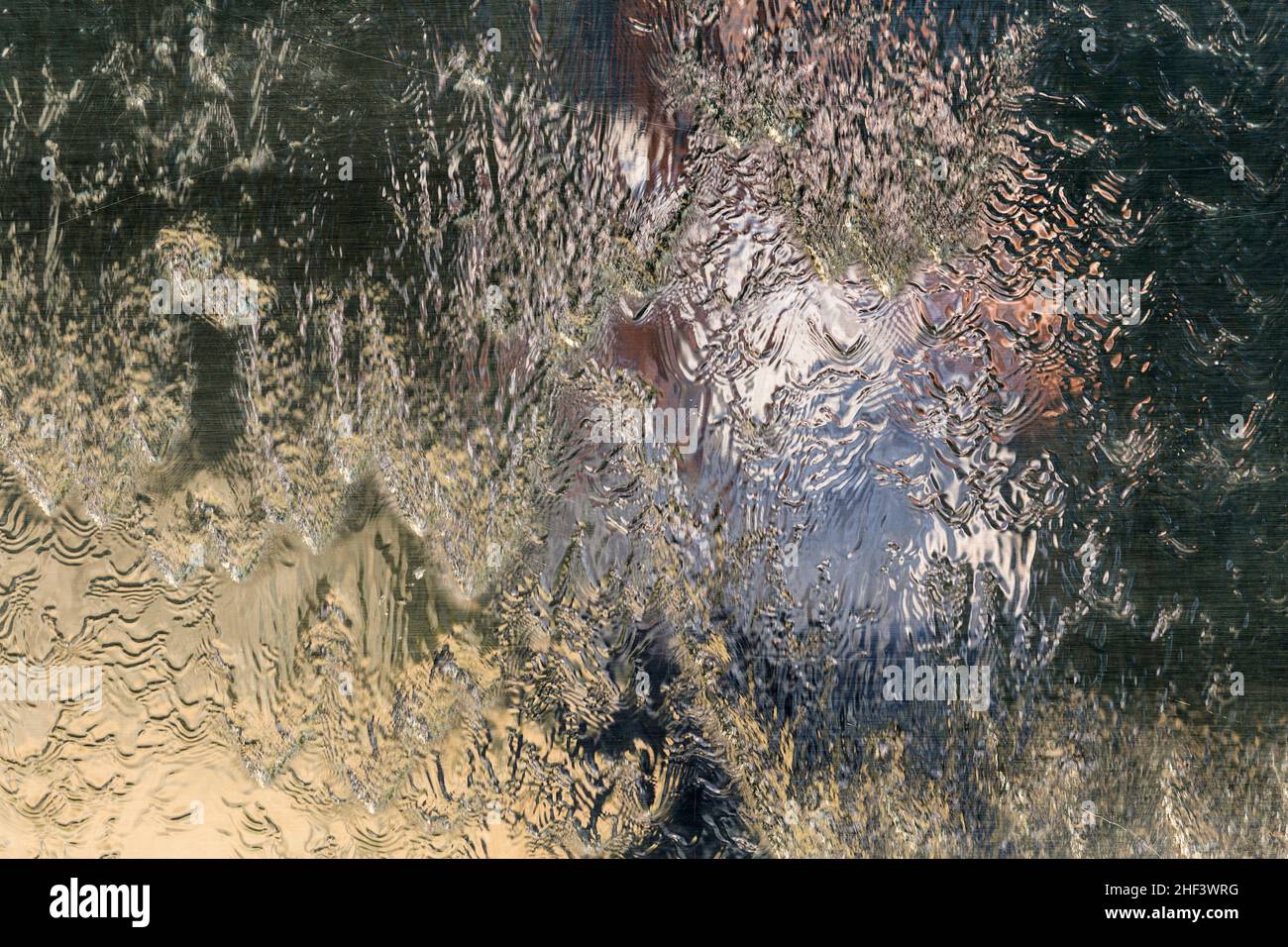 beautiful pattern of flowing water at a metal wall Stock Photo - Alamy