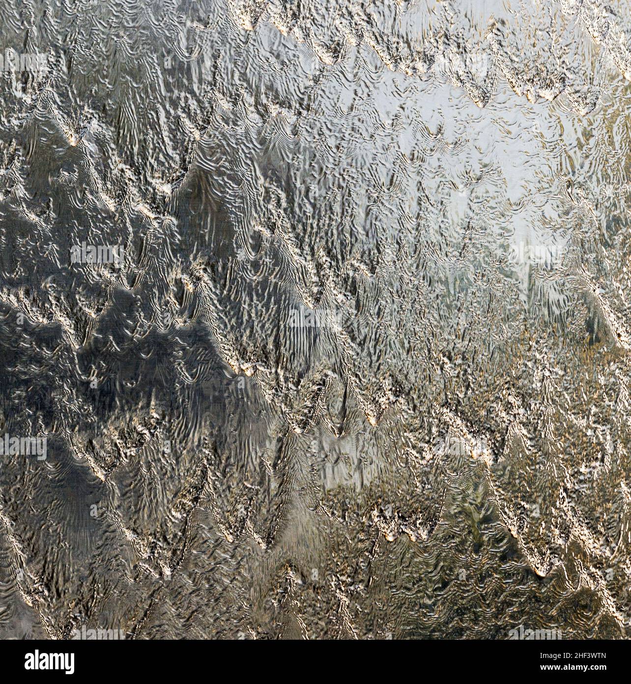 beautiful pattern of flowing water at a metal wall Stock Photo - Alamy