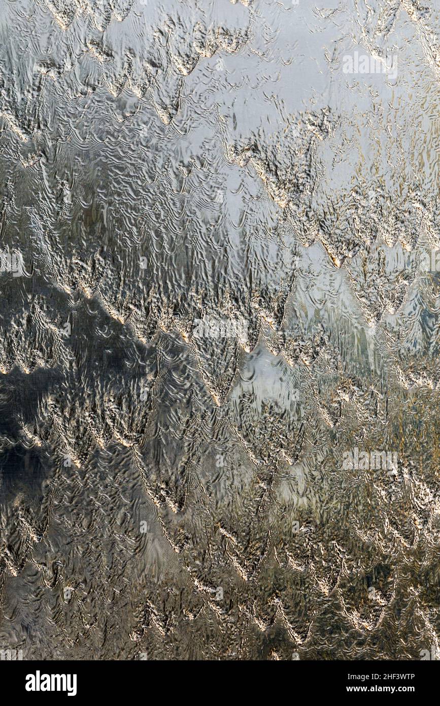 beautiful pattern of flowing water at a metal wall Stock Photo - Alamy