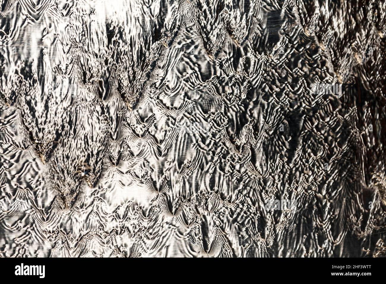 beautiful pattern of flowing water at a metal wall Stock Photo - Alamy