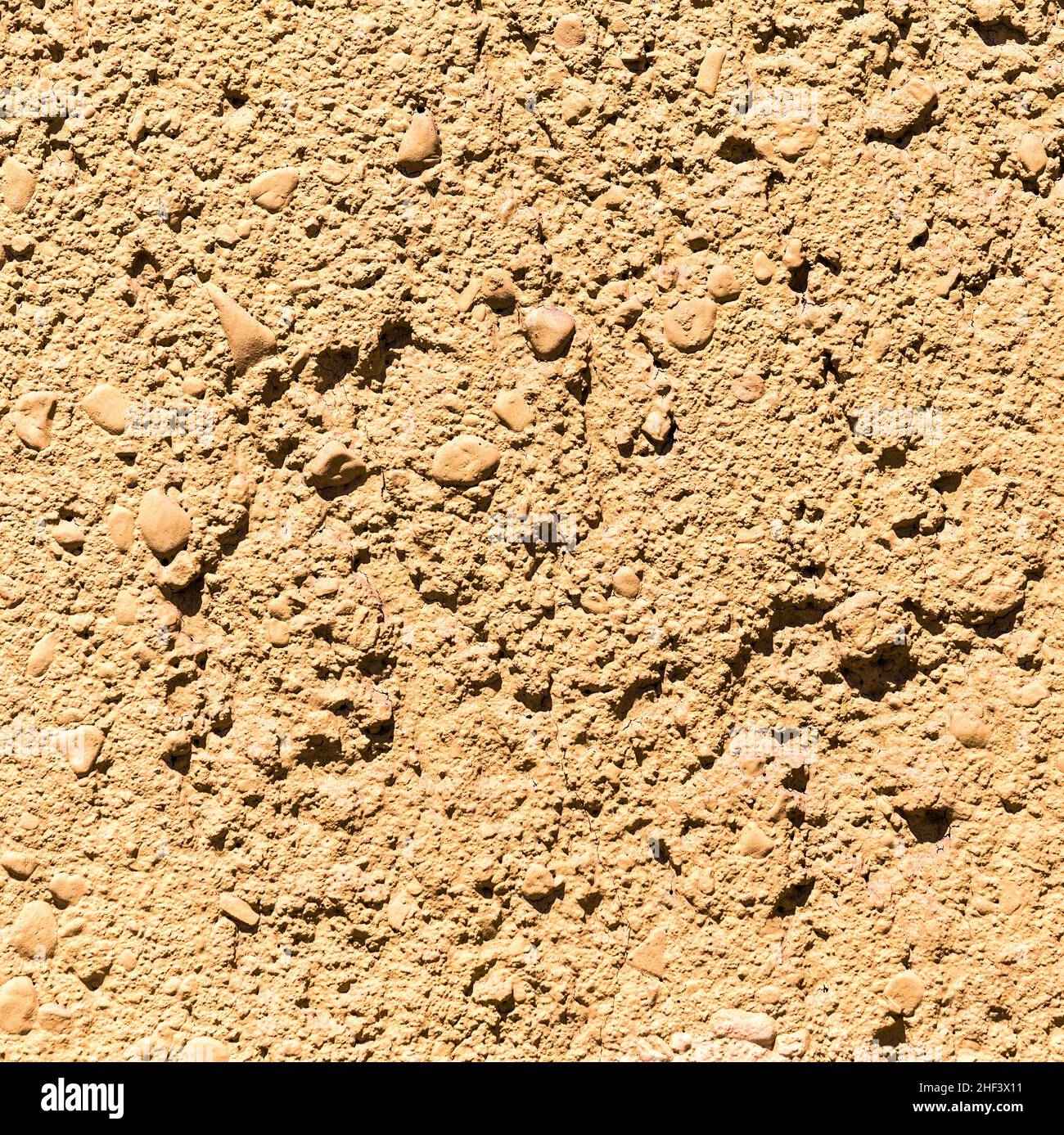 Texture of ocher harmonic concrete wall Stock Photo - Alamy