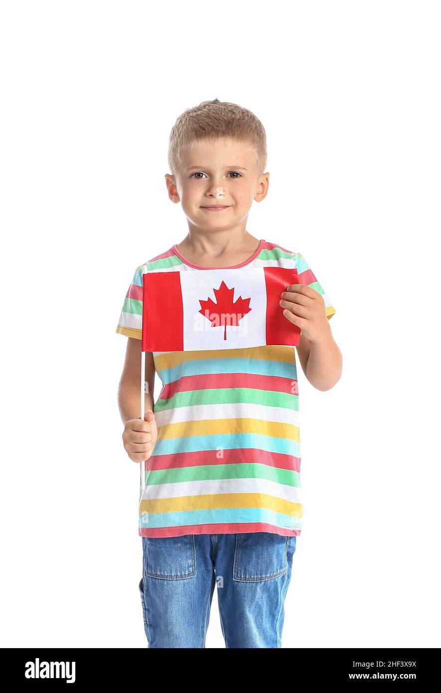 Adorable little boy with flag of Canada on white background Stock Photo ...