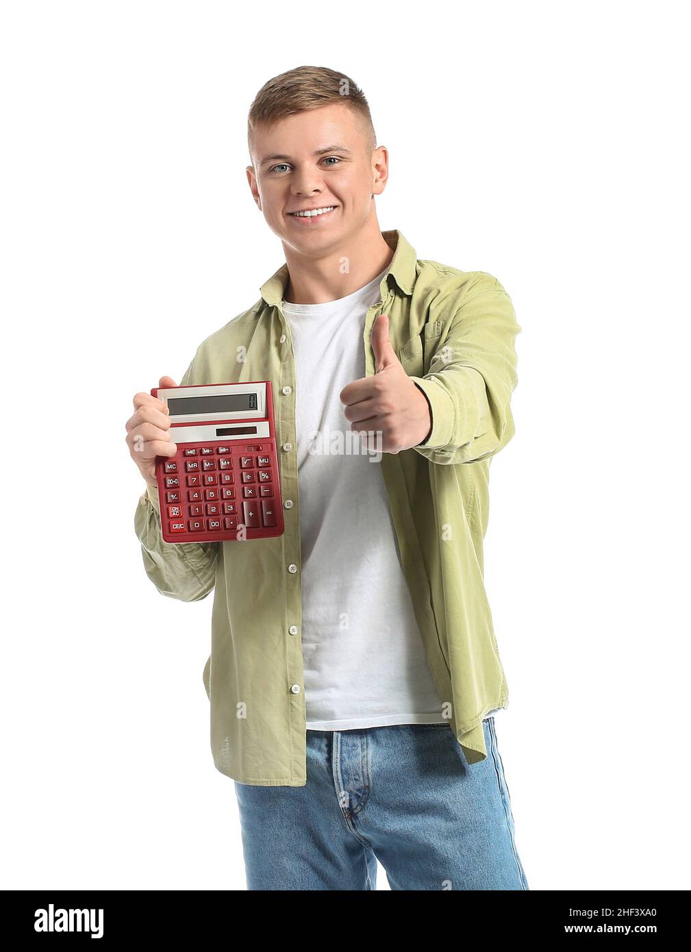 Handsome young man with calculator showing thumb-up on white background ...