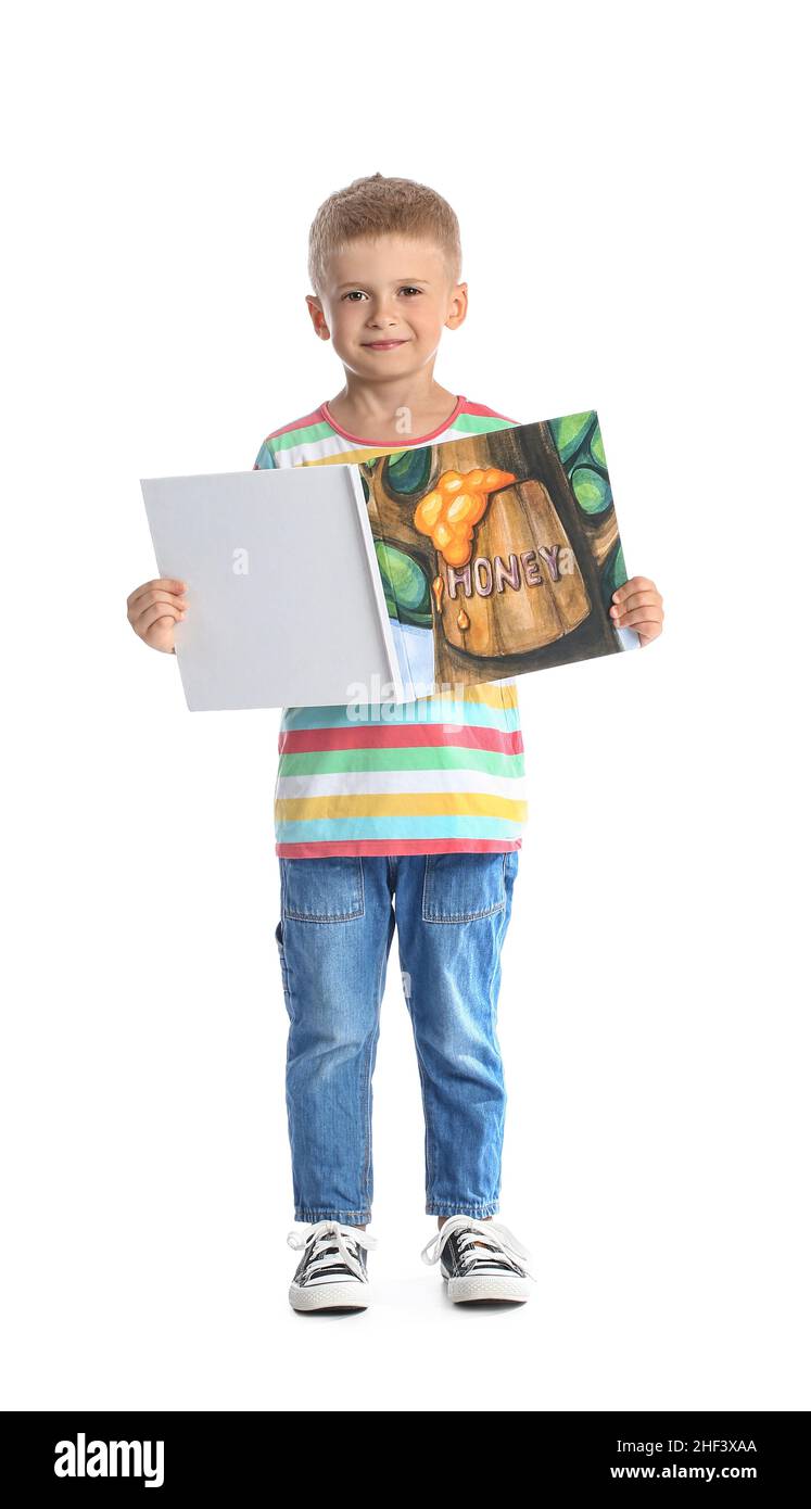 Adorable little boy with open book on white background Stock Photo - Alamy
