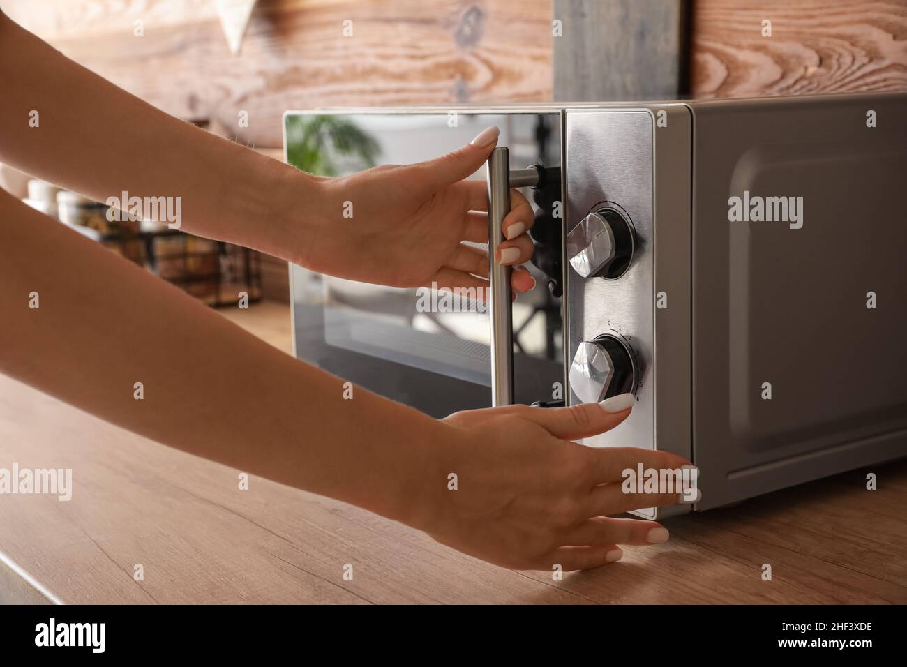 Opening microwave in kitchen hi-res stock photography and images - Alamy