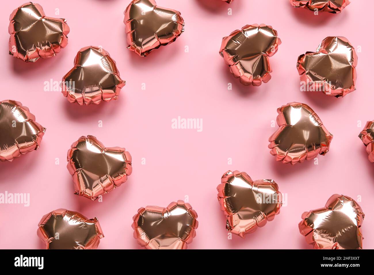 Frame made of heart-shaped air balloons for Valentine's day on pink ...