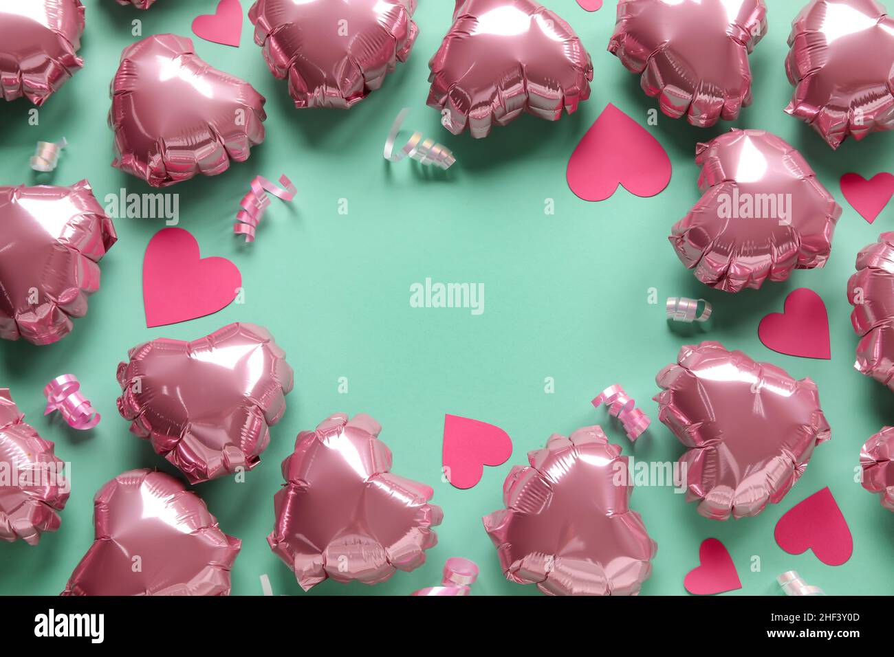 Frame made of heart-shaped air balloons for Valentine's day on color ...