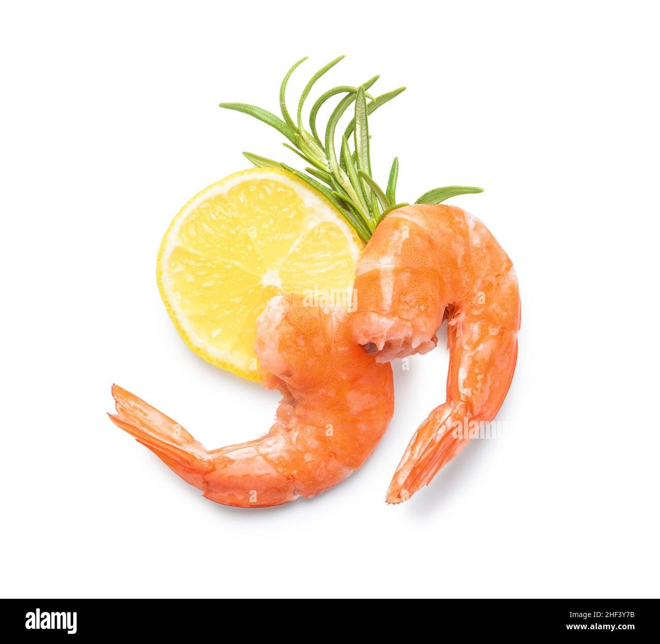 Tasty boiled shrimp tails with slice of lemon and rosemary on white ...