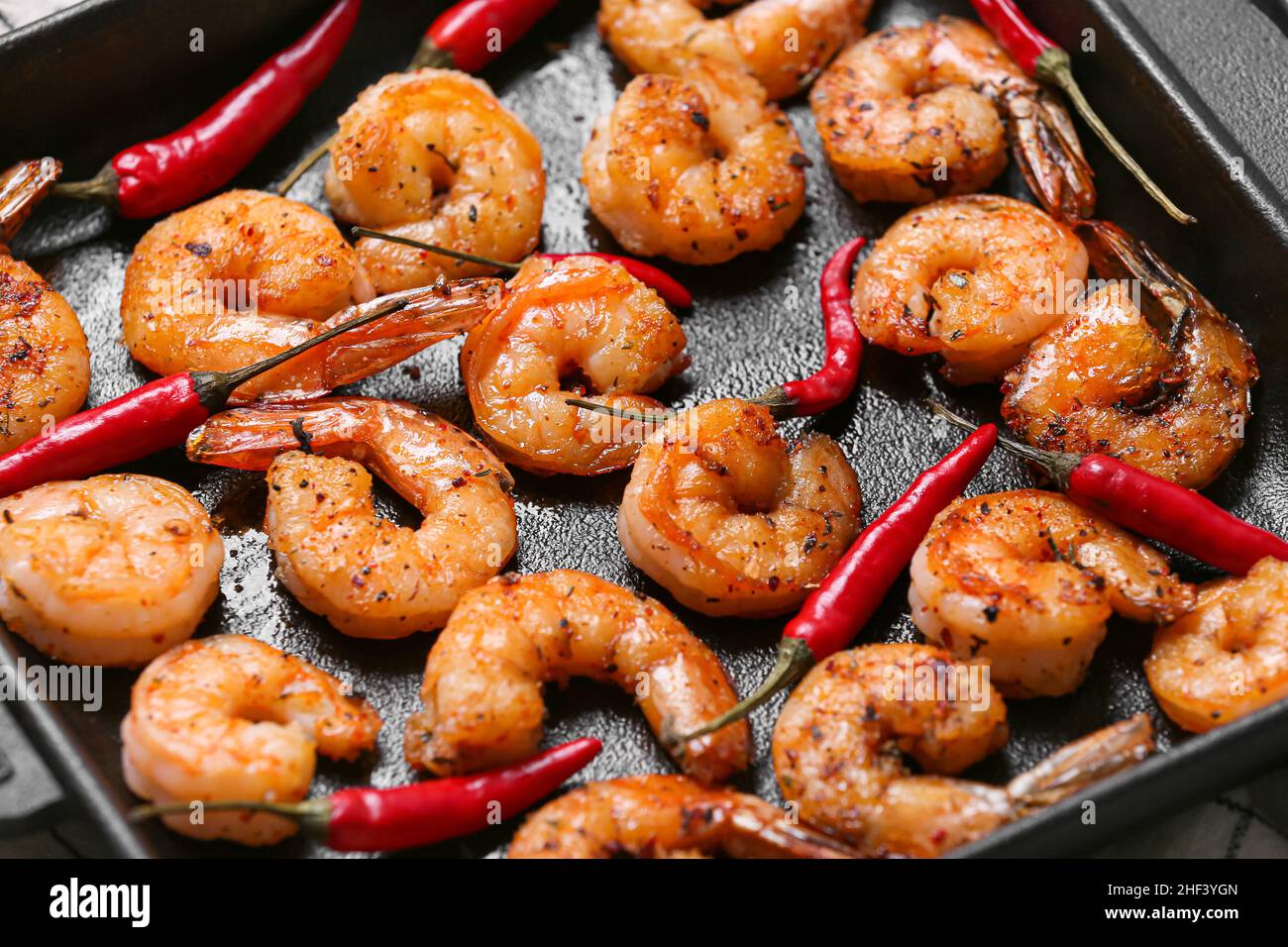 Tasty shrimp tails in baking dish, closeup Stock Photo - Alamy