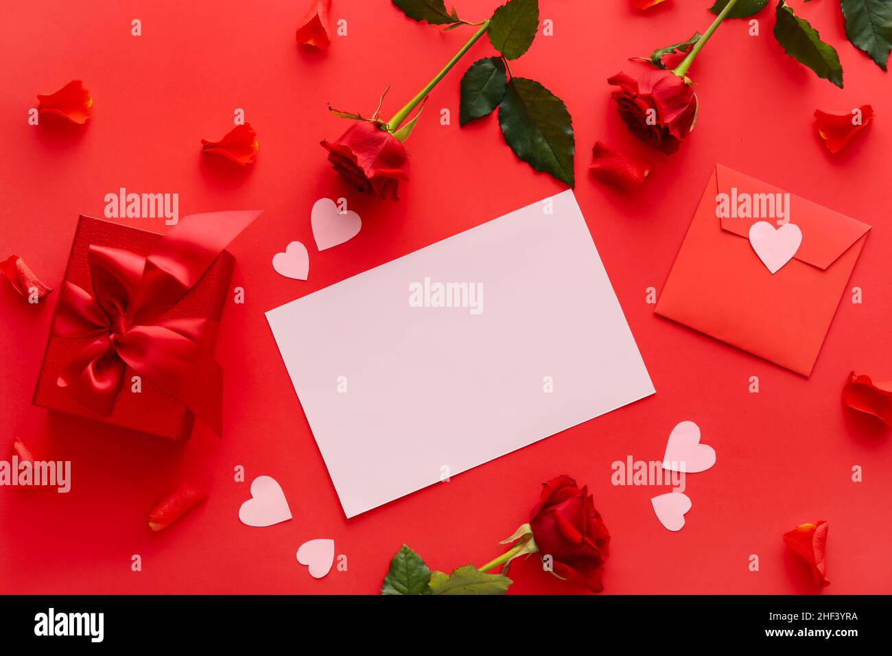 Composition with blank card, envelope, gift for Valentine's Day and ...