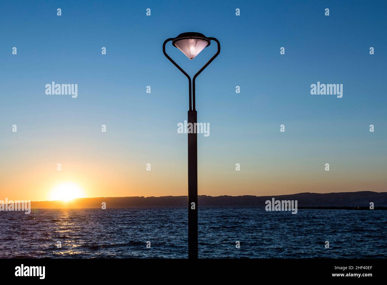 lantern with burning light at sunset at the Corniche, Marseille Stock ...