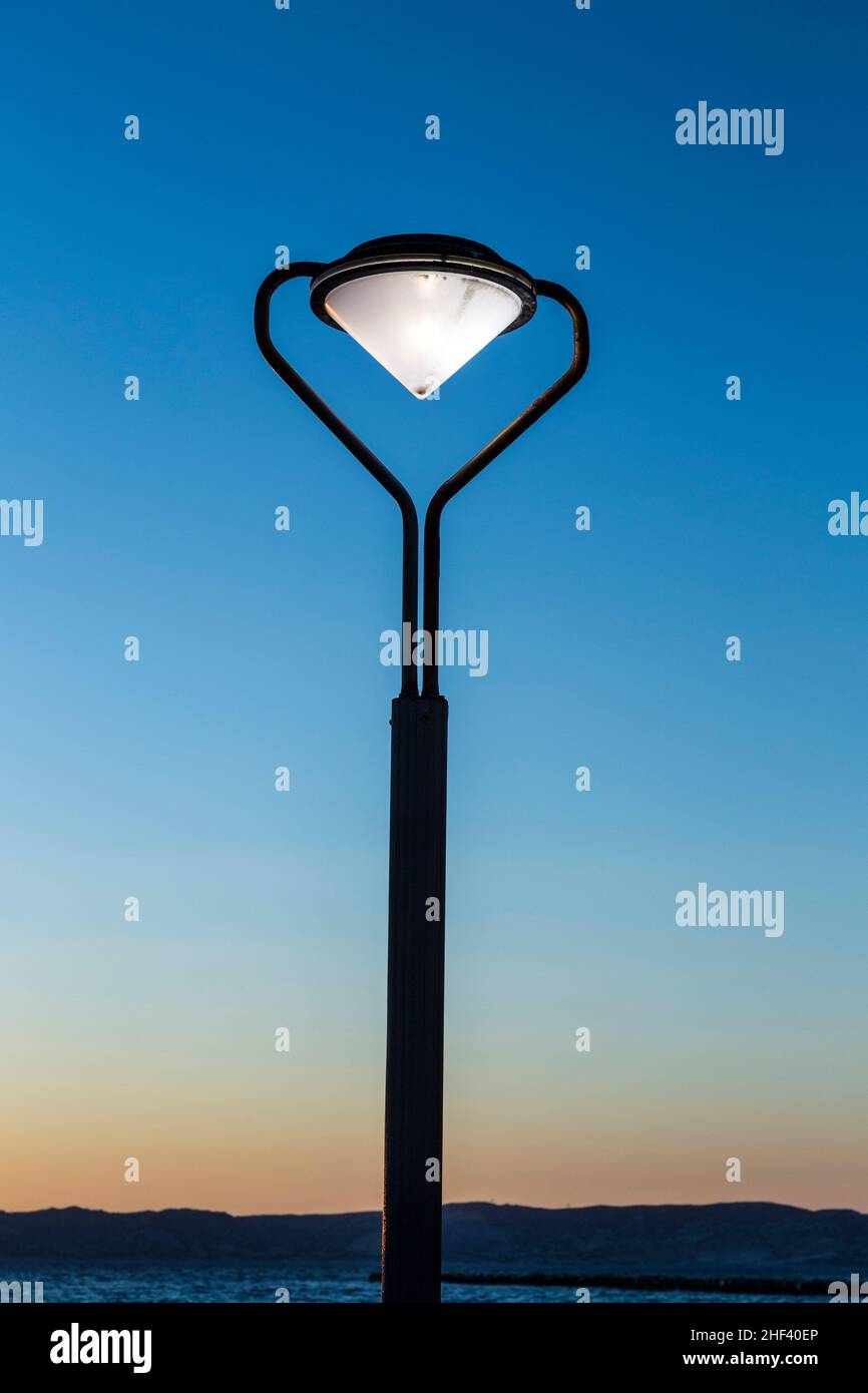 lantern with burning light at sunset at the Corniche, Marseille Stock ...