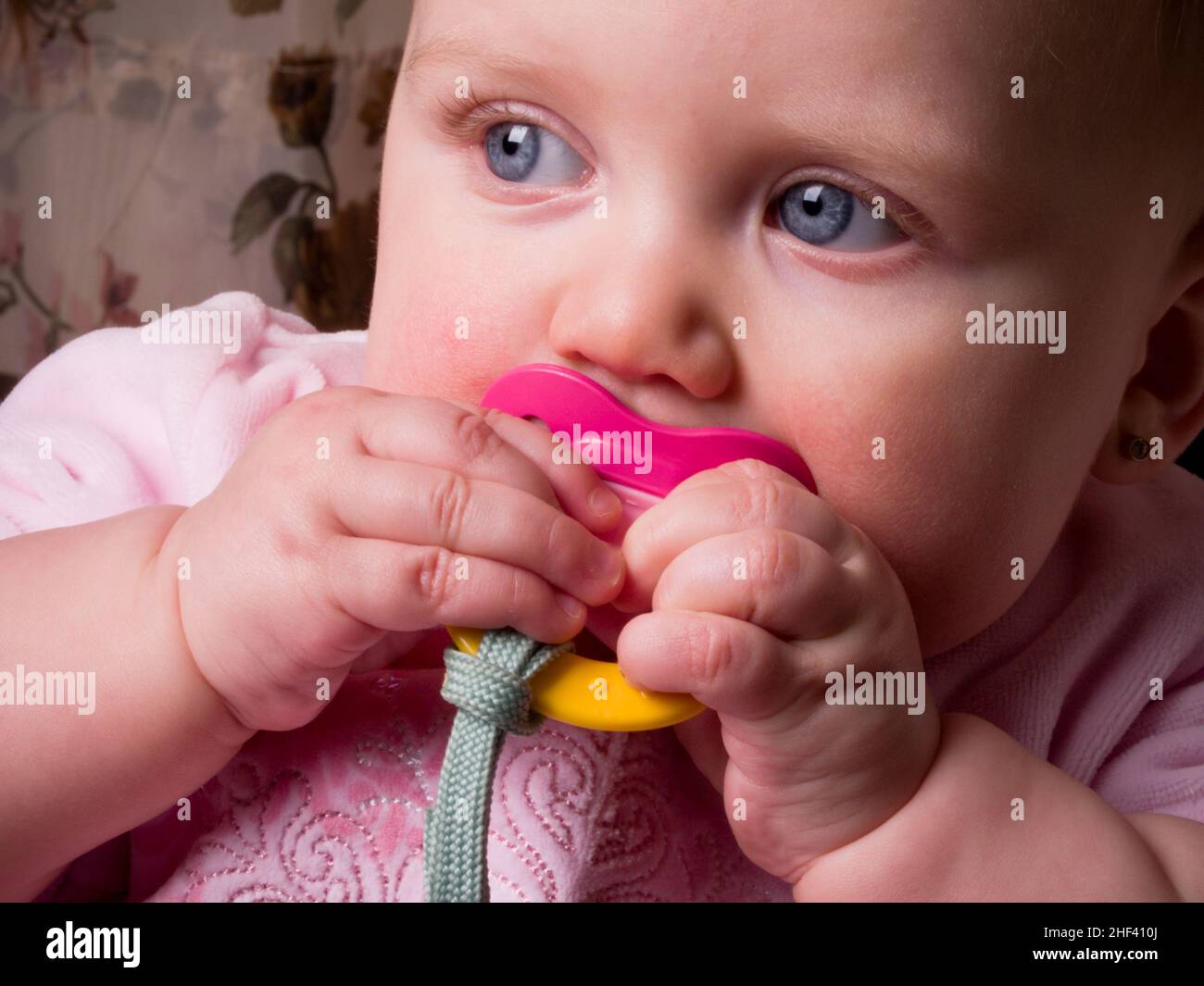 Baby Face sucking on binky, pacifier Stock Photo - Alamy