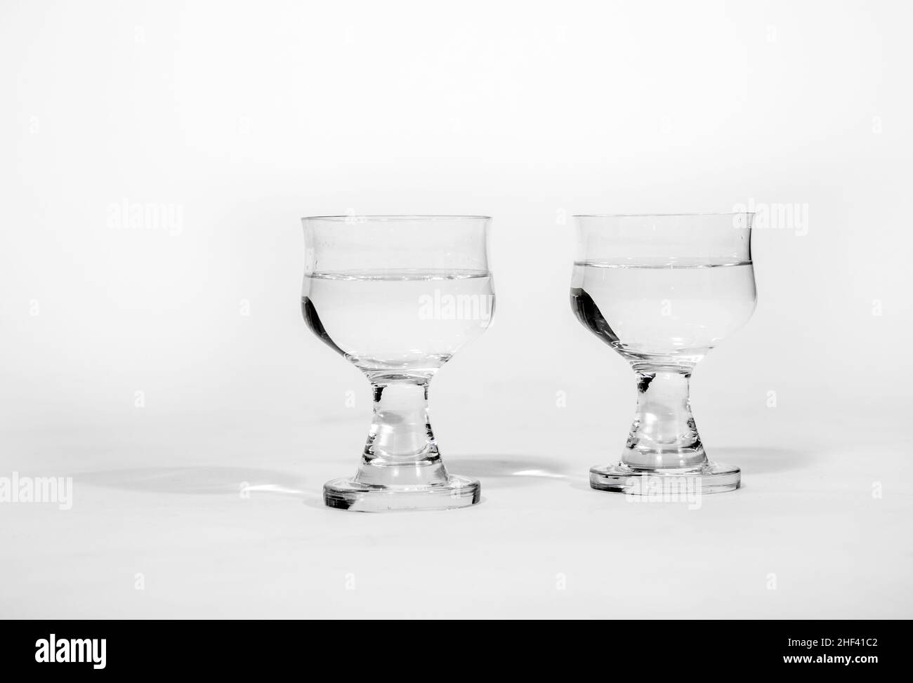 simple glass isolated on white with water Stock Photo - Alamy